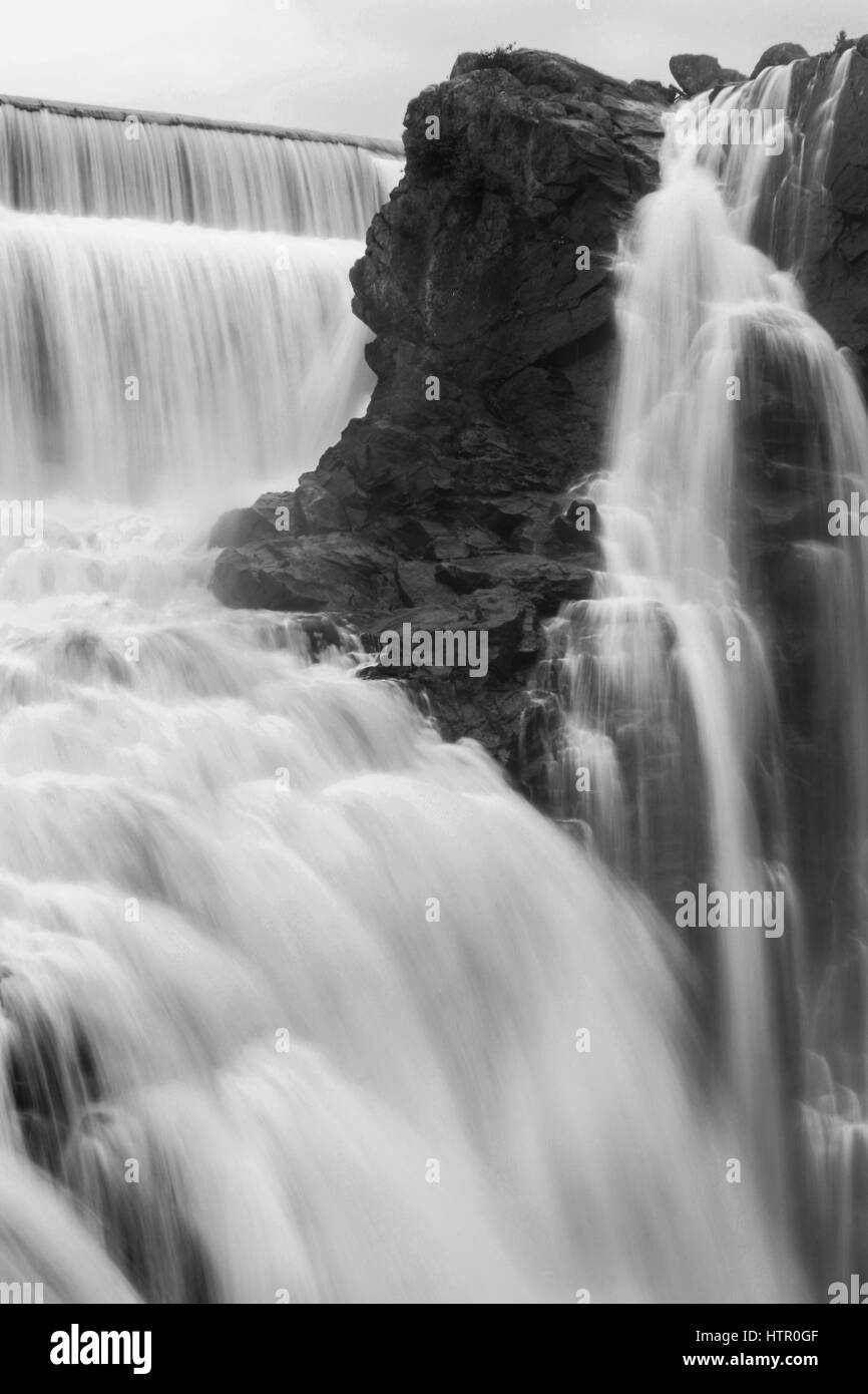 Waterfall flowing in rocks Black and White Stock Photos & Images - Alamy