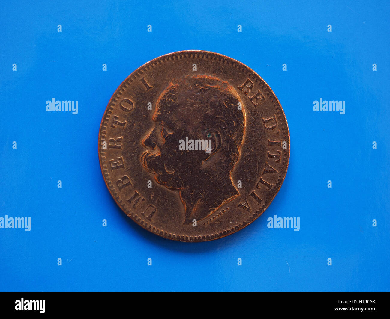 10 cents coin money (ITL), currency of Kingdom of Italy over blue ...