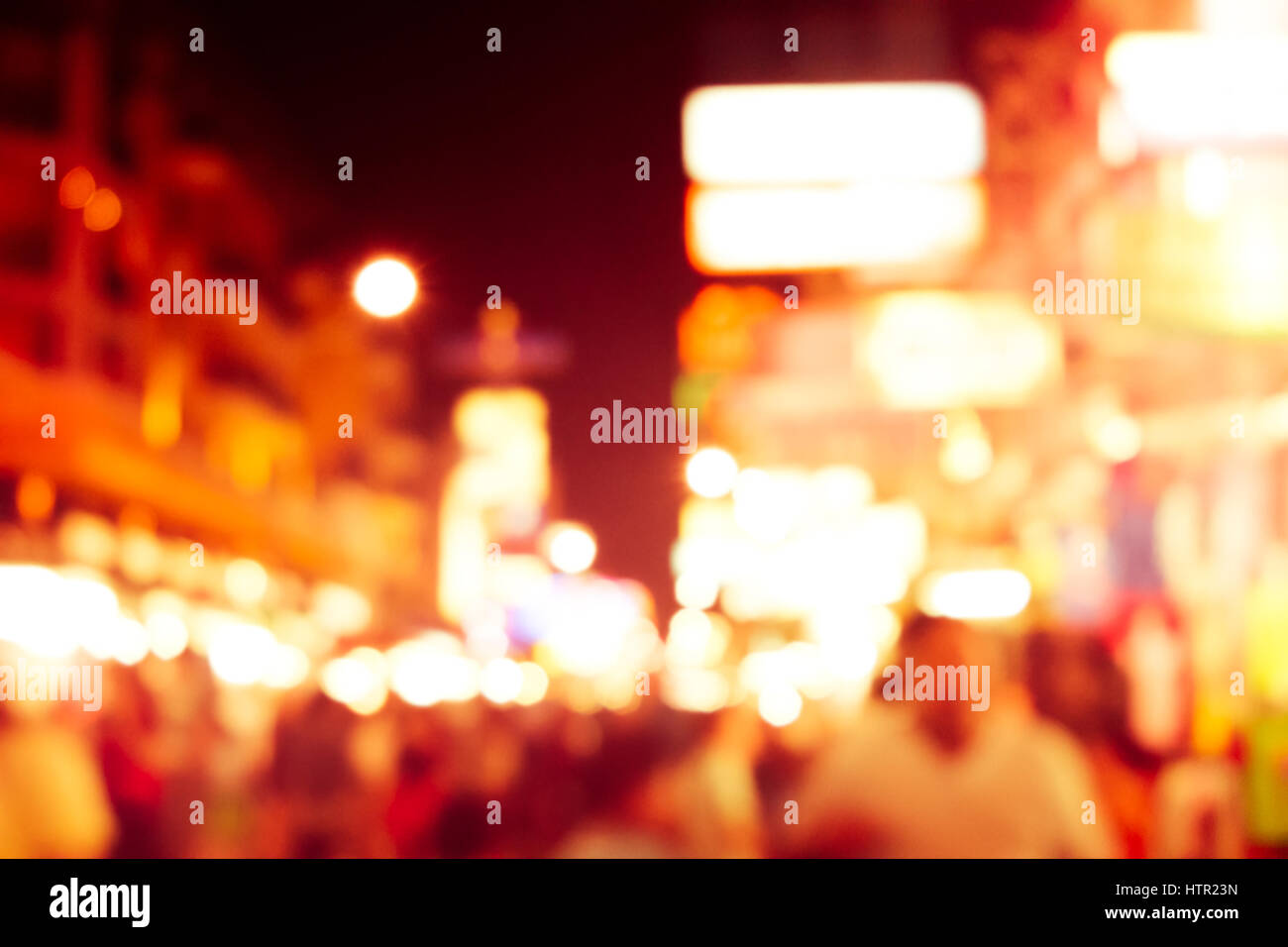 Blurred image of busy night life in the city Stock Photo - Alamy