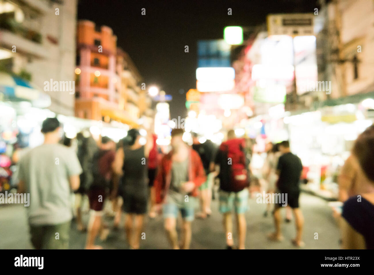 Blurred image of busy night life in the city Stock Photo - Alamy