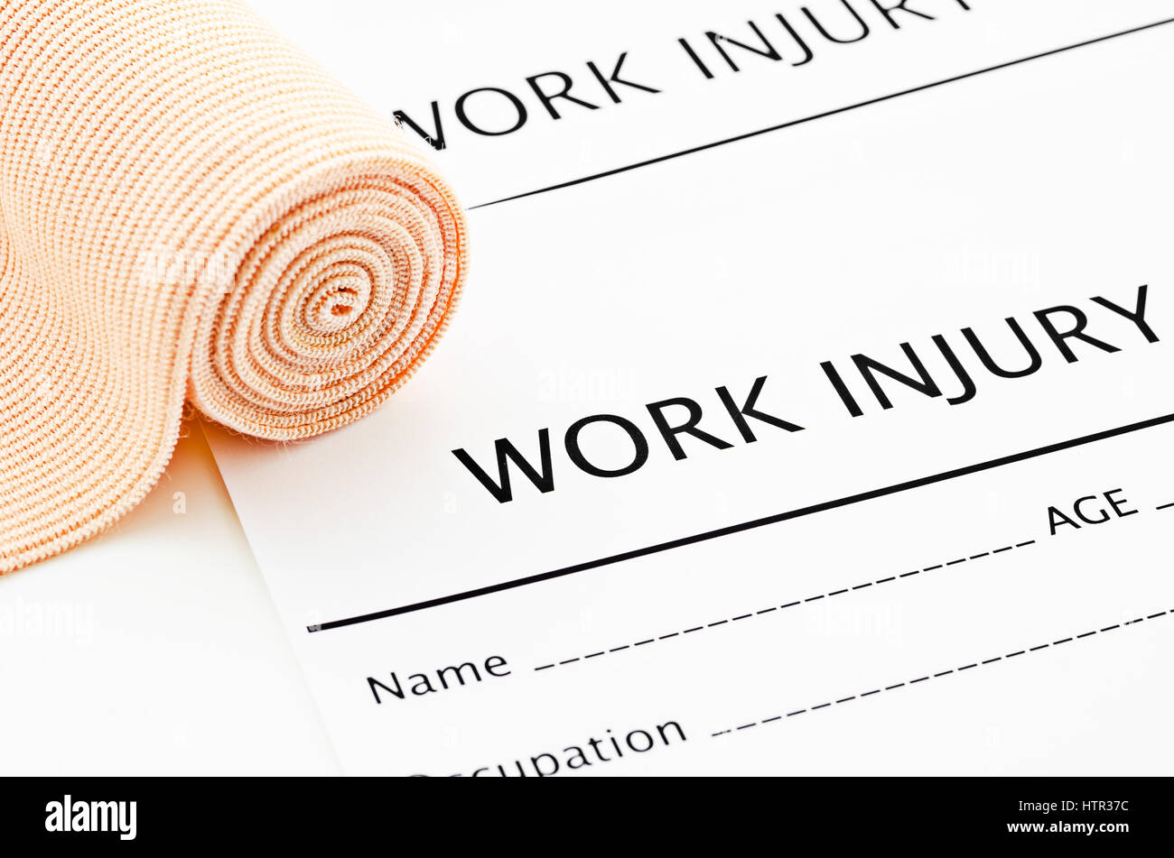 Work Injury claim form with medical bandage on white background Stock ...