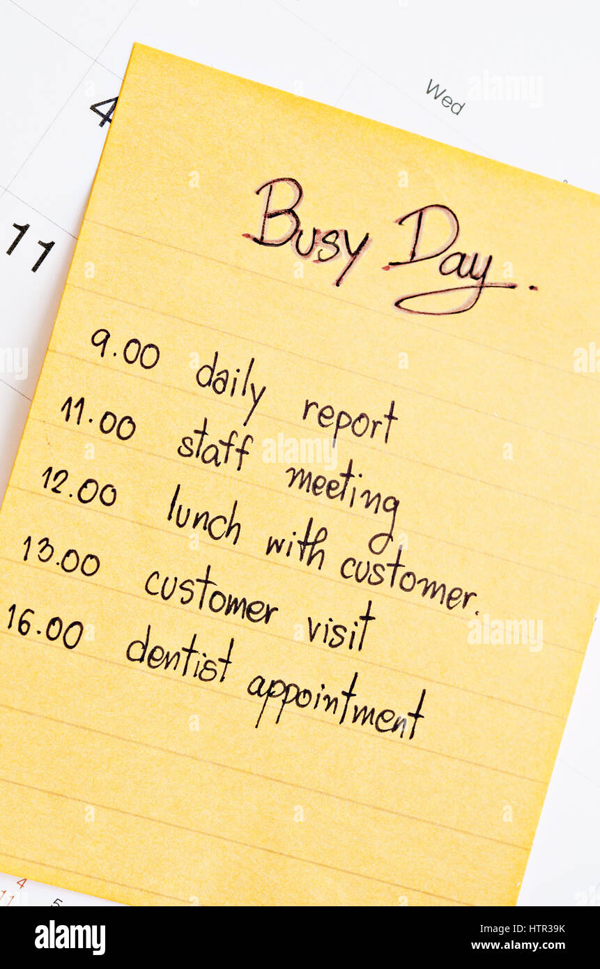 Businessman showing calendar hi-res stock photography and images - Alamy
