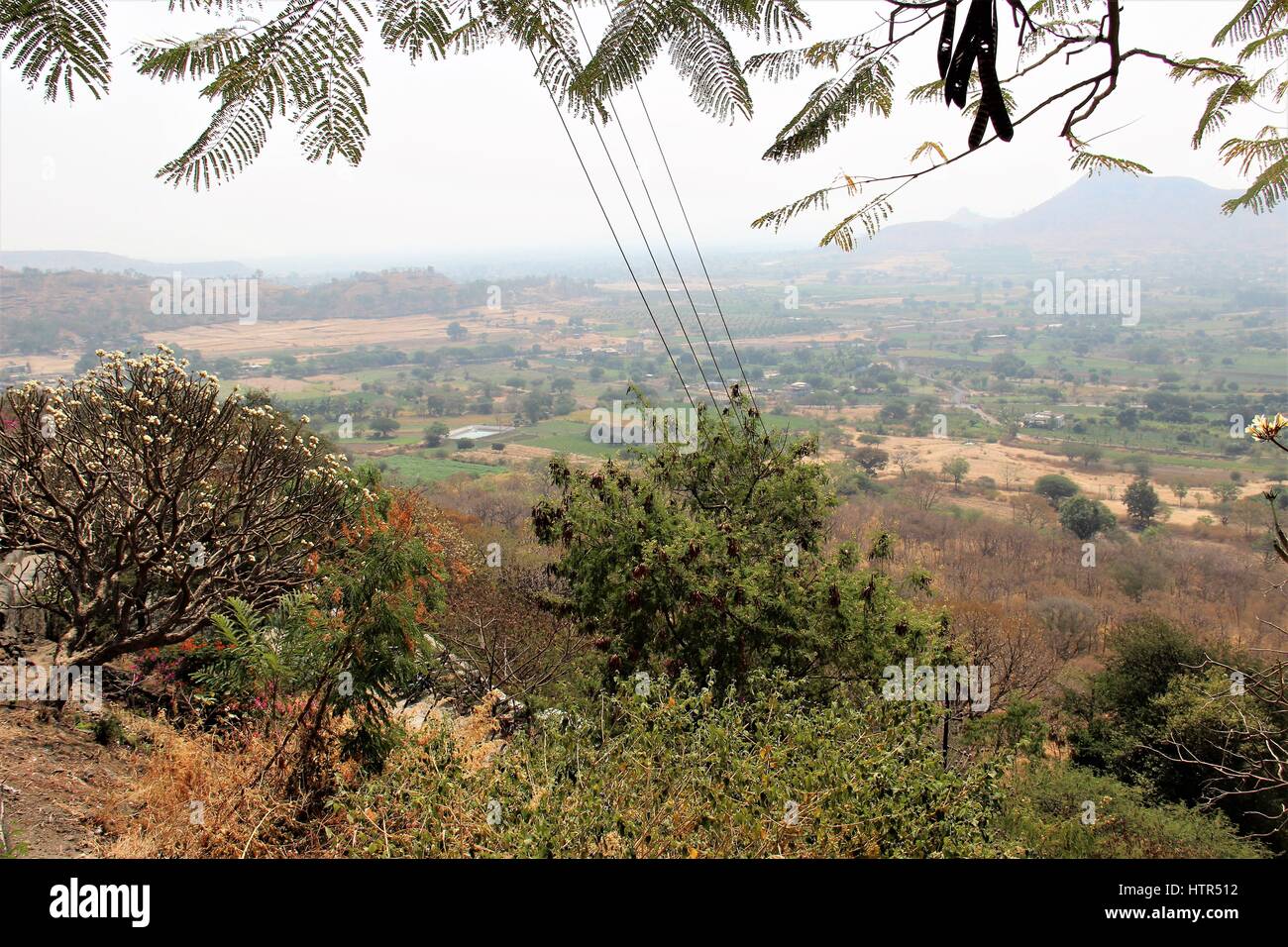 Down sloping view of fields Stock Photo - Alamy