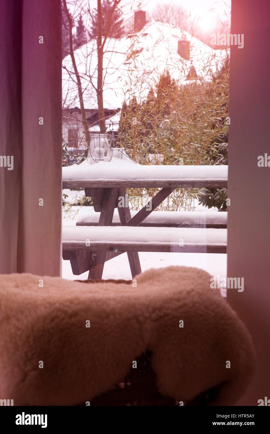 view out of window into snowy garden Stock Photo - Alamy
