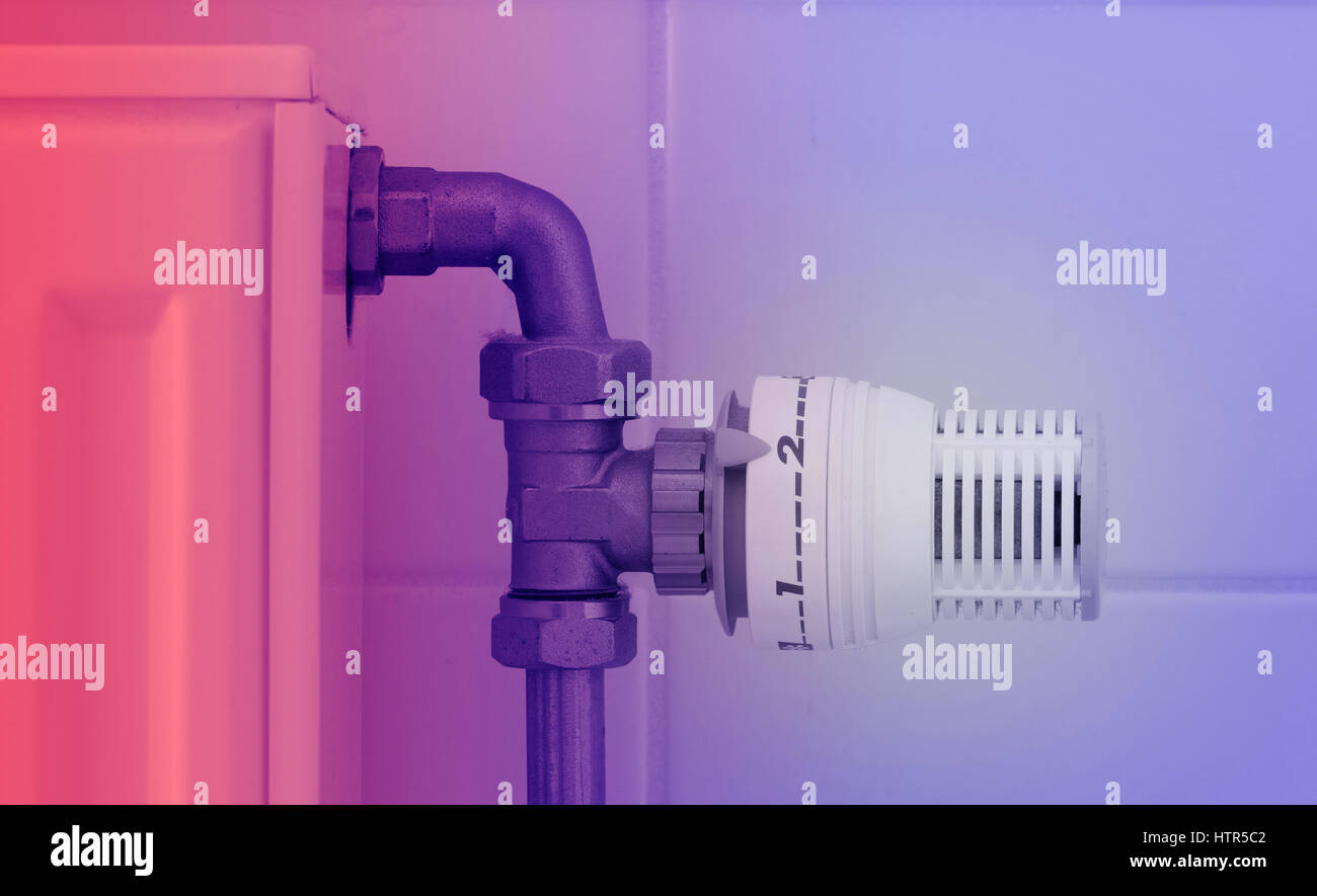 Temperature knob of heating radiator, used and dusty - 2 Stock Photo ...