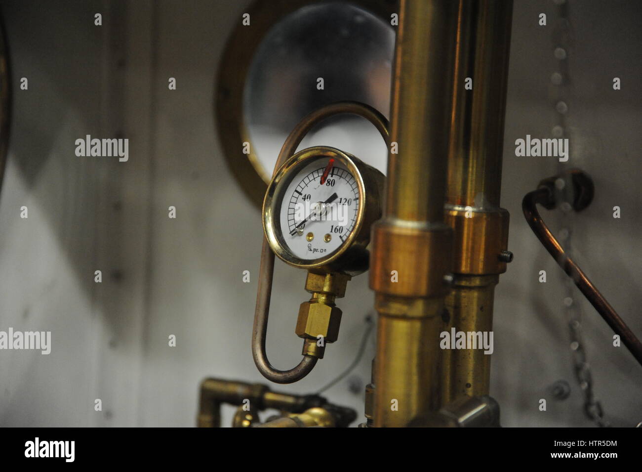 Steam valve pressure guage Stock Photo - Alamy