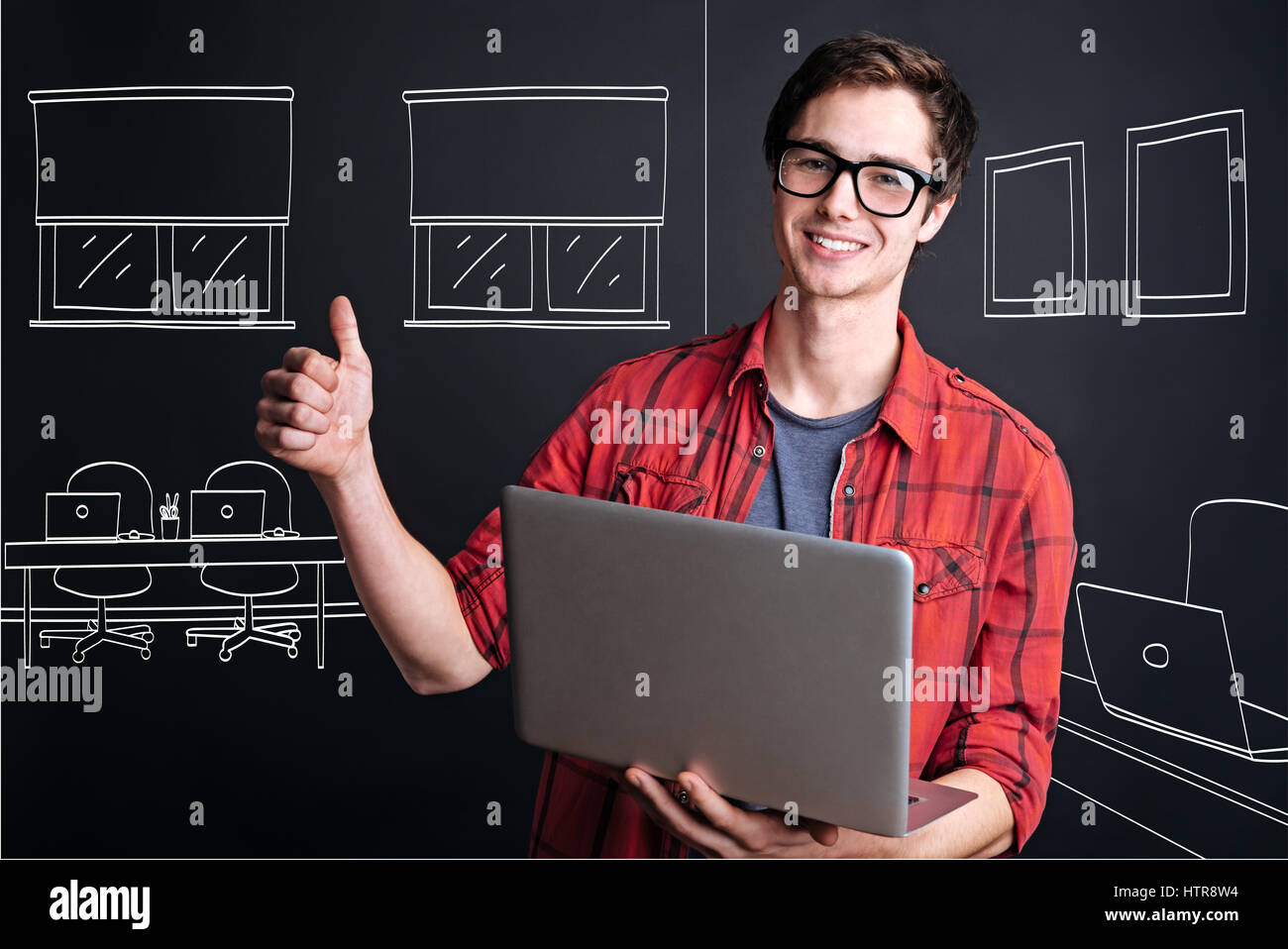 I like studying process. Cheerful diligent smart student smiling and ...