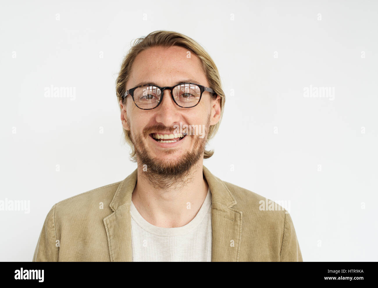 Adult guy smiling positive studio portrait Stock Photo - Alamy