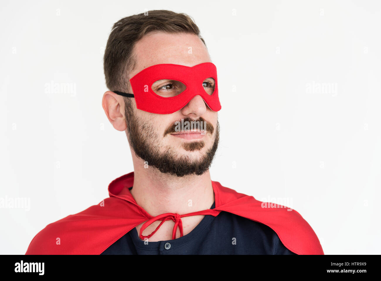 Man wearing a red superhero costume Stock Photo - Alamy
