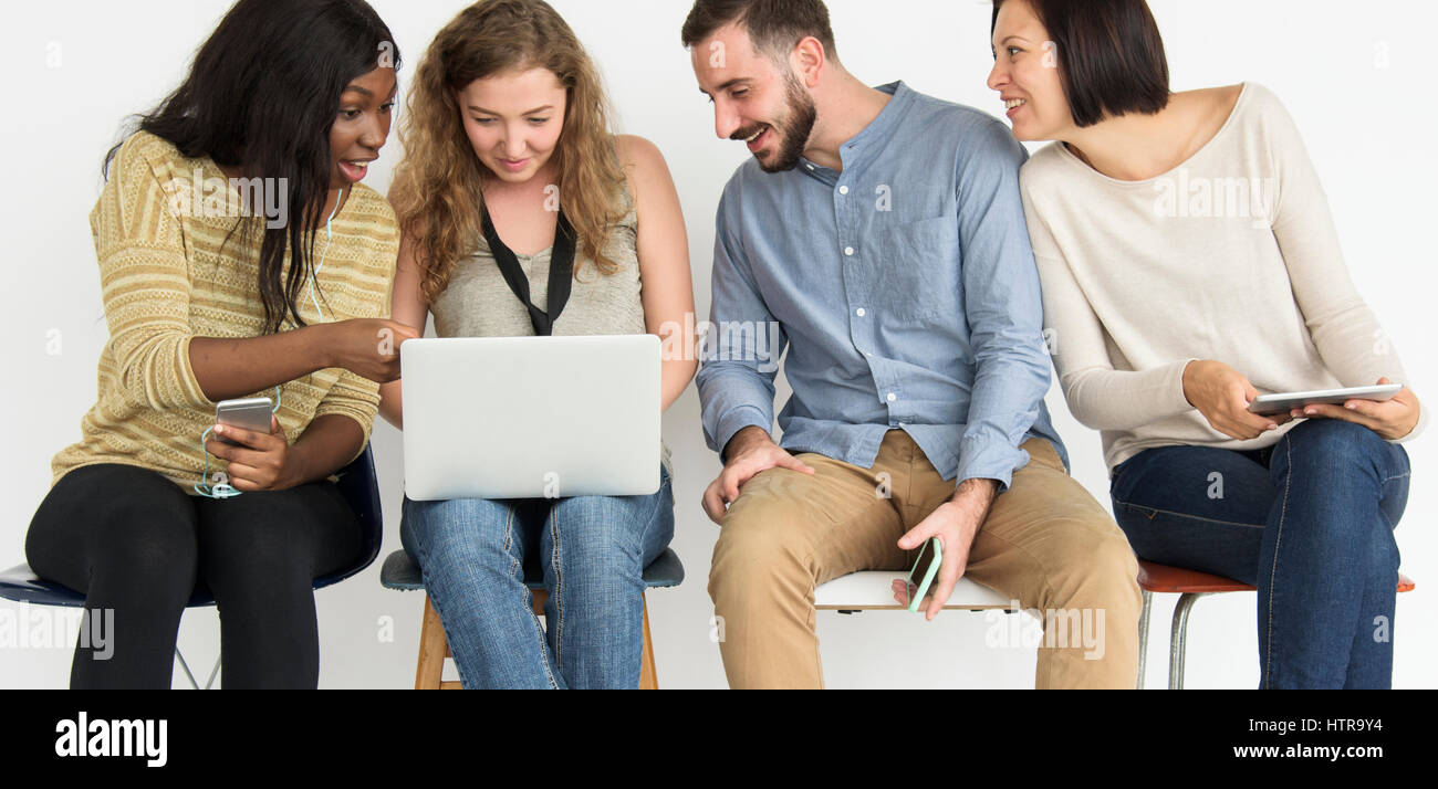 Diverse group of people using electronic devices Stock Photo - Alamy