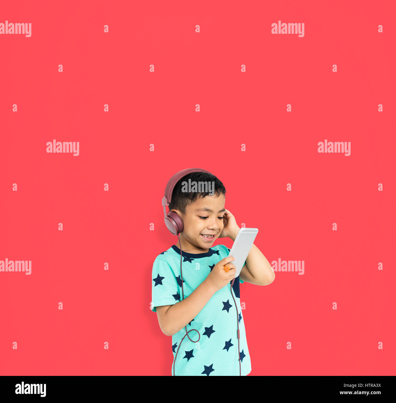 Little Boy Listen Music Smile Studio Stock Photo - Alamy