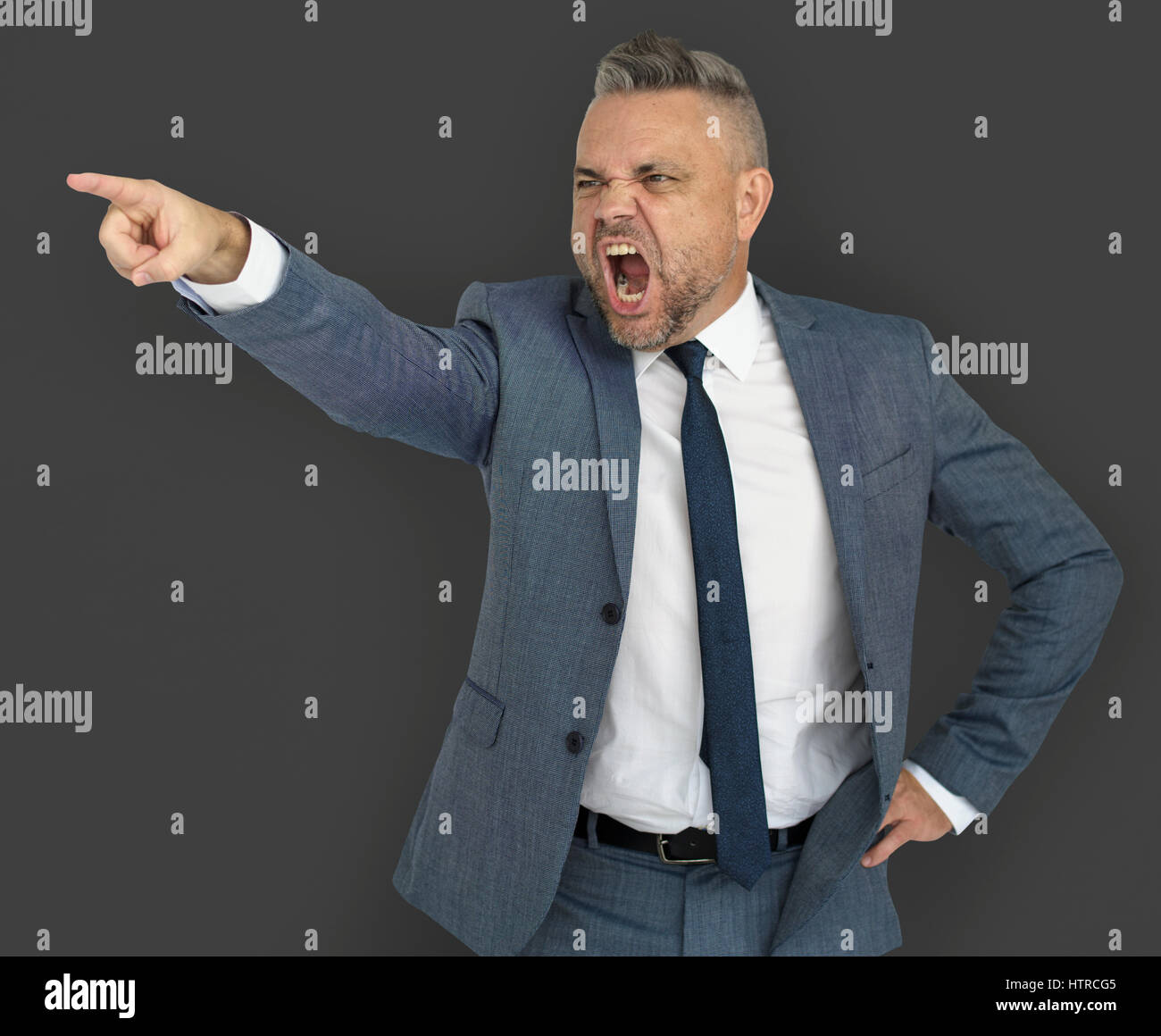 Caucasian Business Man Pointing Angry Stock Photo - Alamy