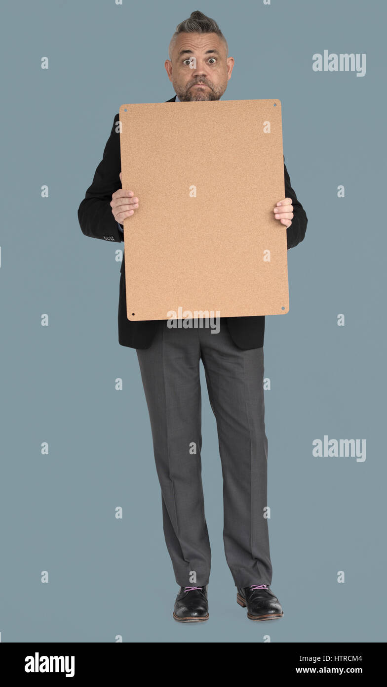 Caucasian Business Man Holding Board Stock Photo - Alamy