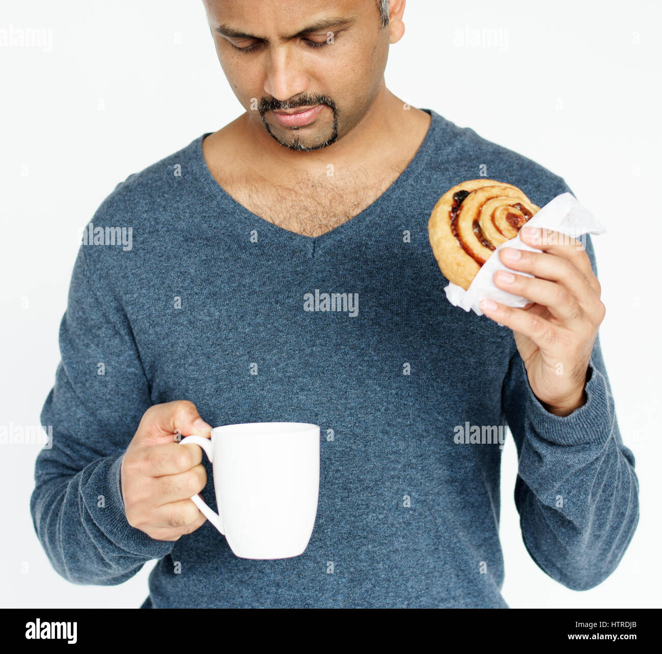 Man holding bread roll hi-res stock photography and images - Alamy