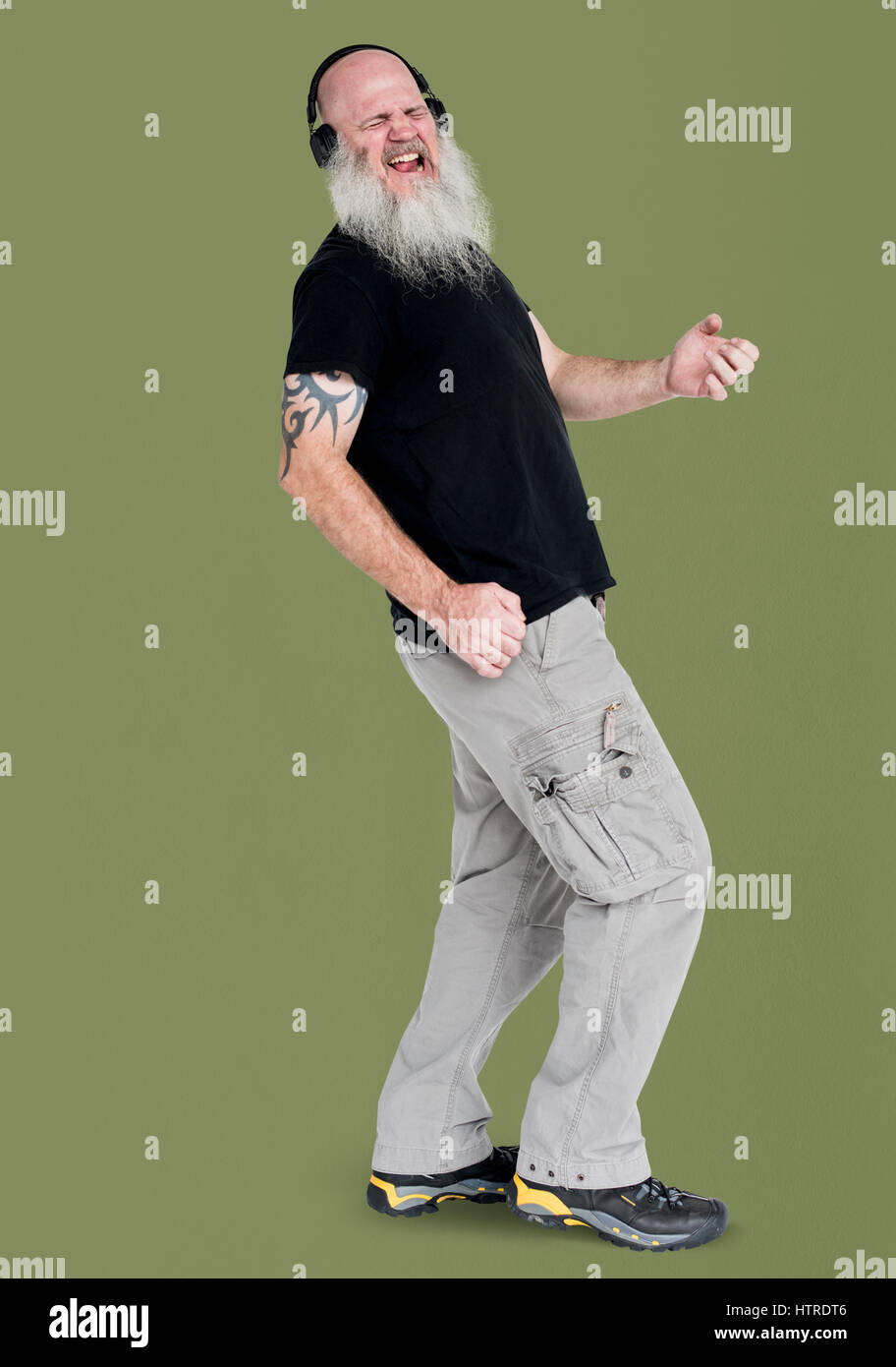 Bearded rocker guy playing air guitar portrait Stock Photo - Alamy