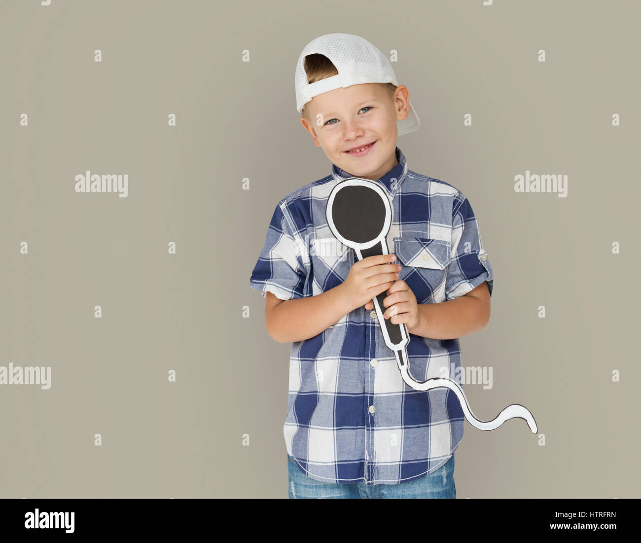 Boy microphone hi-res stock photography and images - Alamy