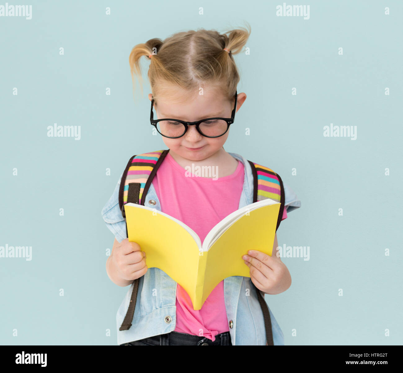 Little Girl Reading Textbook Education Knowledge Stock Photo - Alamy