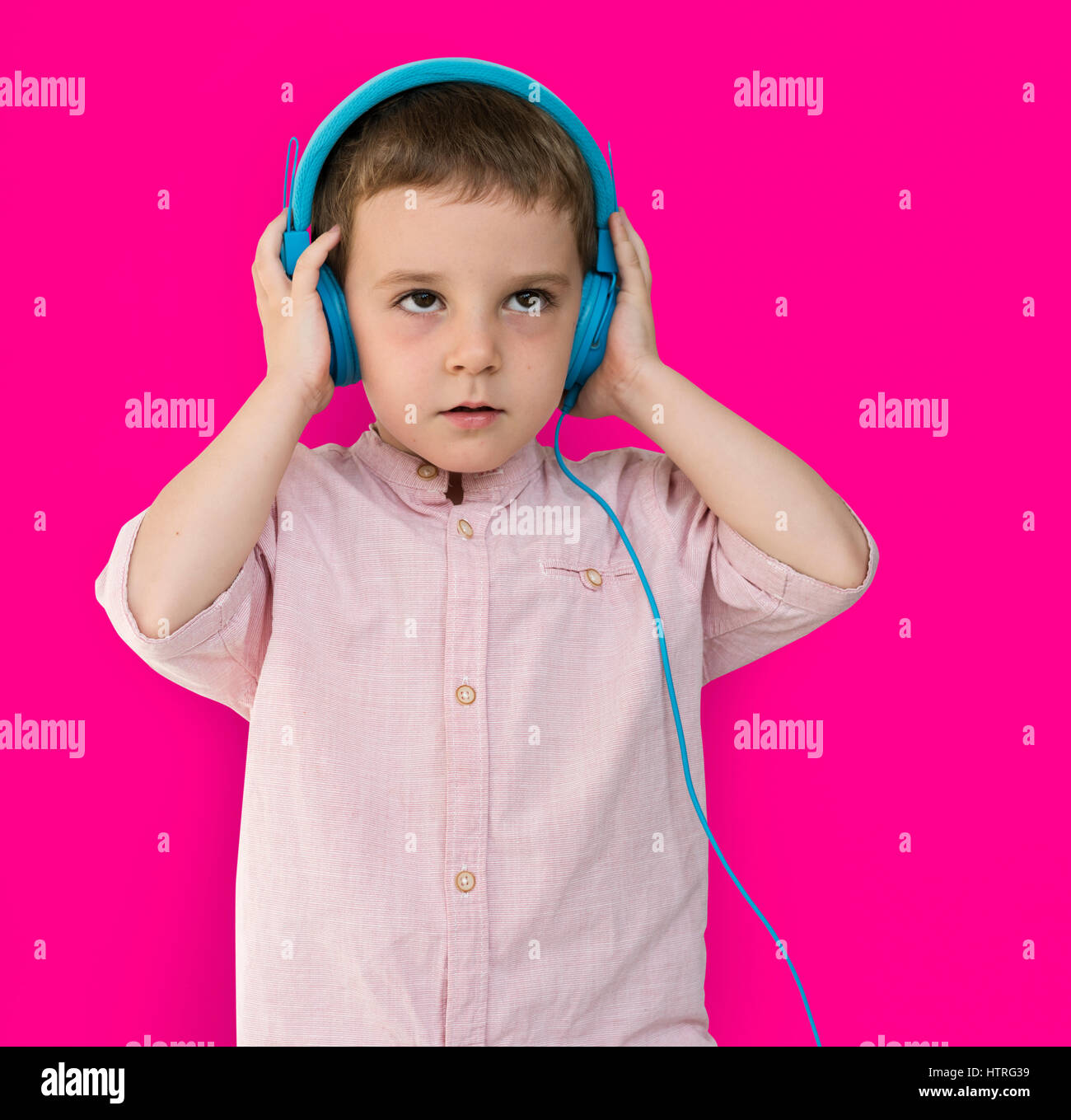 Caucasian Little Boy Trying Headphones Stock Photo - Alamy Caucasian Little Boy Trying Headphones Stock Photo - Alamy