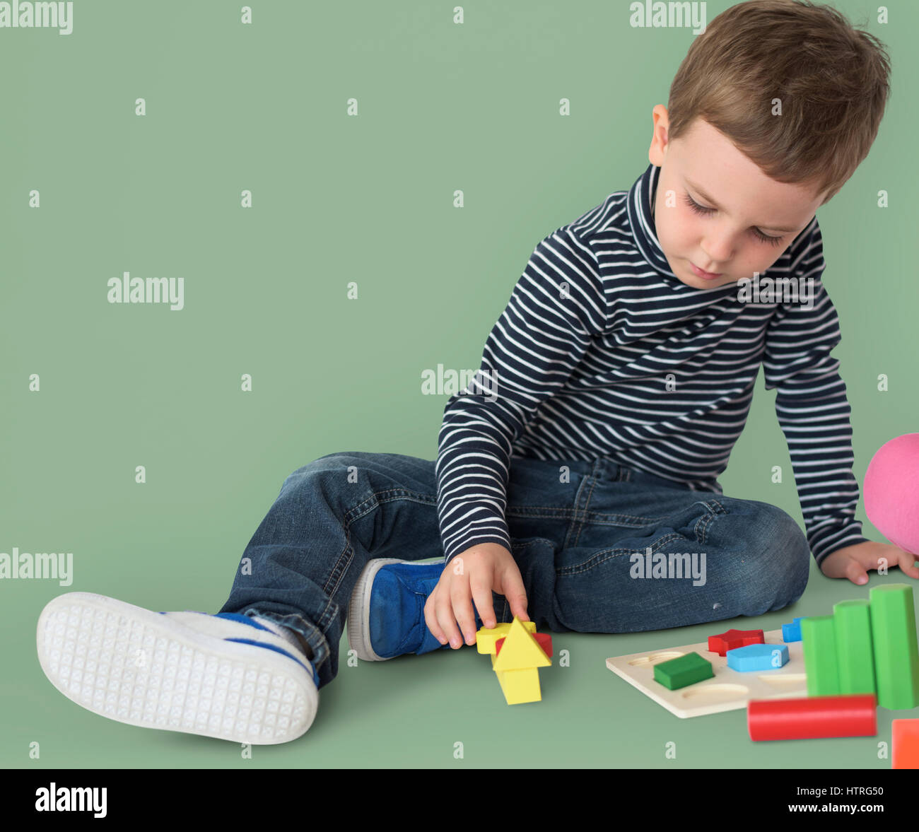 Caucasian Boy Focused Concentrated Play Stock Photo - Alamy