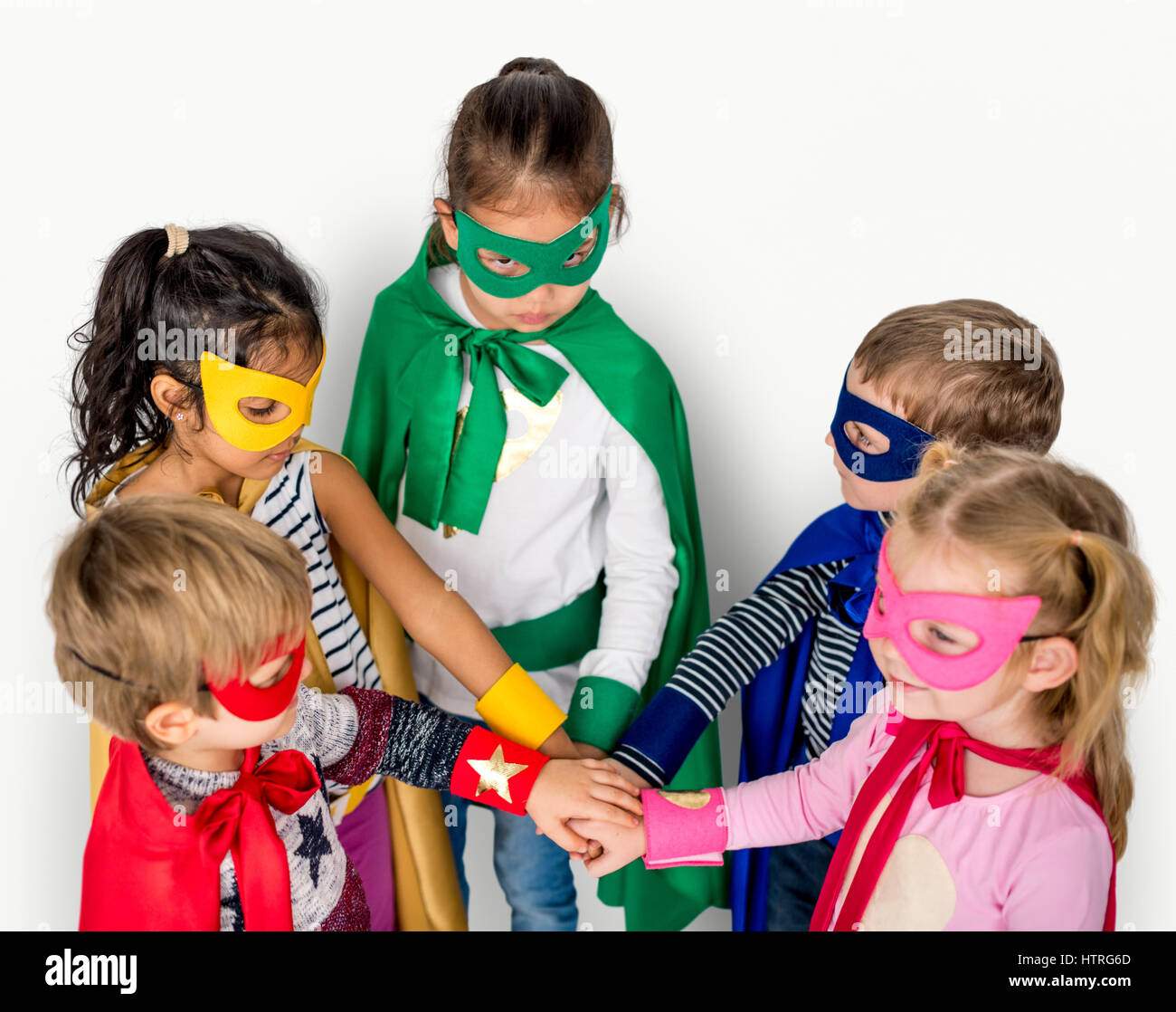 Little Kids Superhero Hands Together Teamwork Stock Photo - Alamy