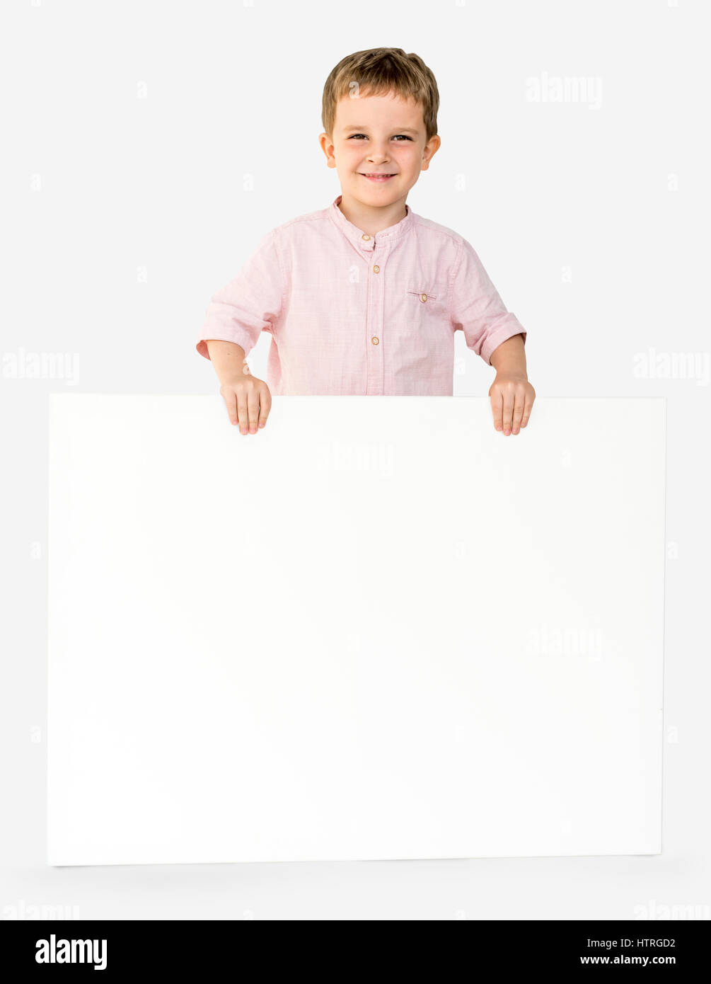 Little Boy Holding Empty Paper Smiling Stock Photo - Alamy