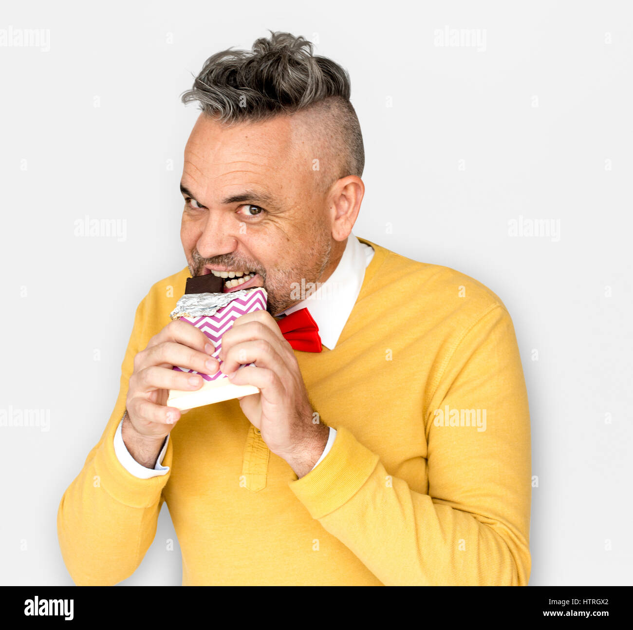 Man eating chocolate hi-res stock photography and images - Alamy