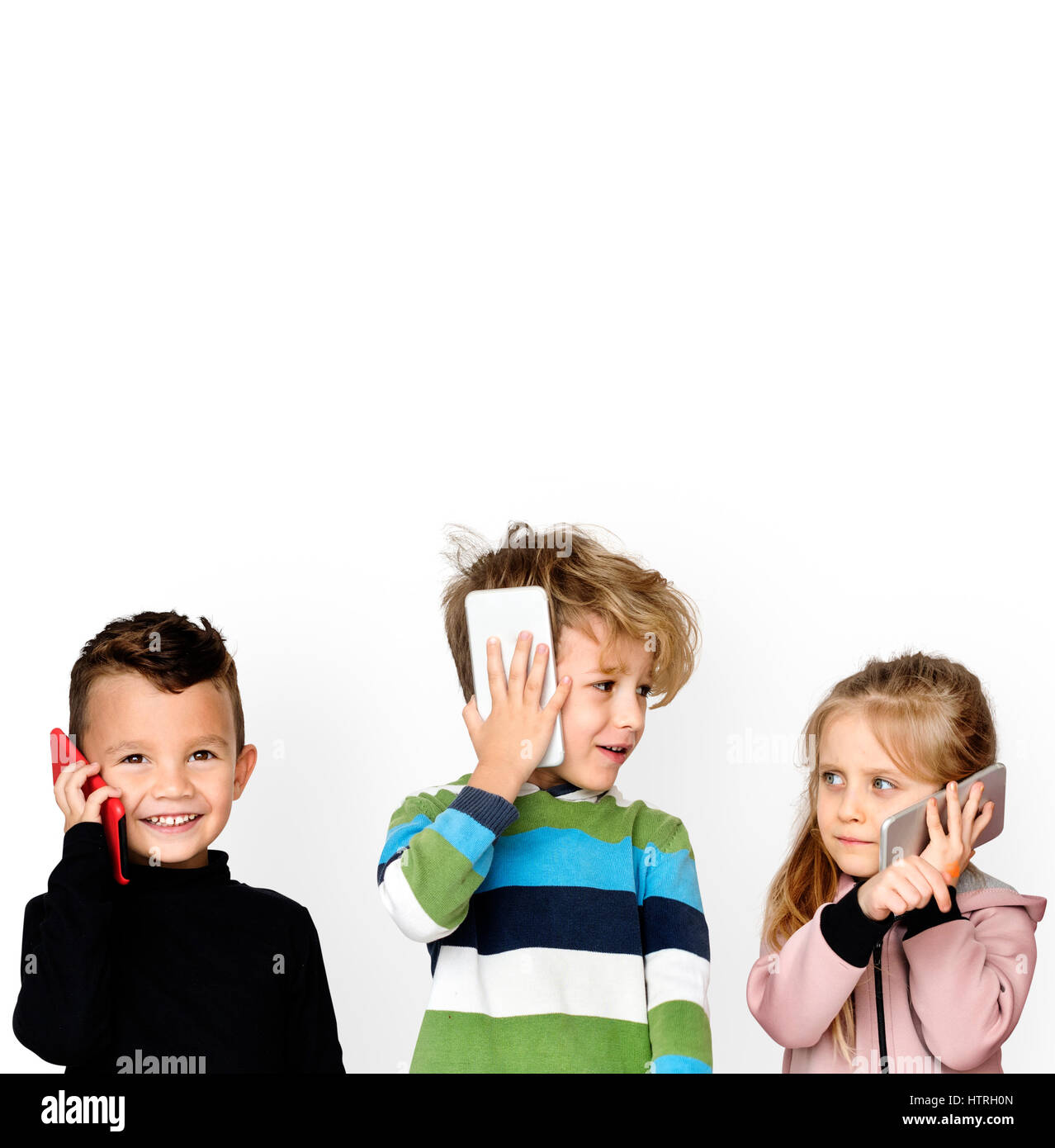 Group of Kids Using Mobile Phone Stock Photo - Alamy