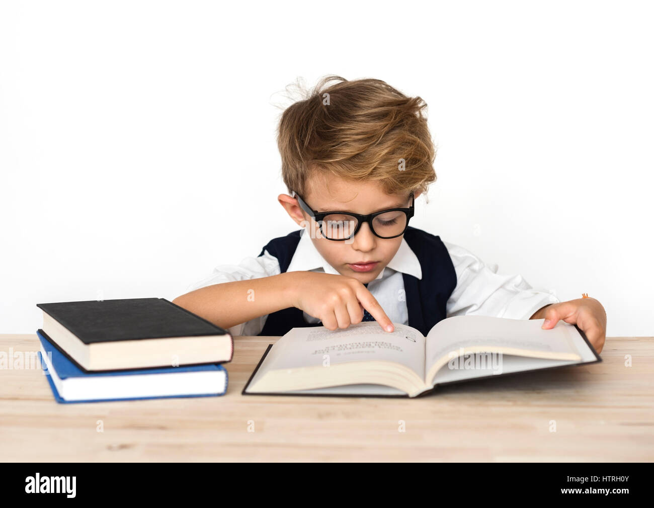 Young Schoolboy Writing Bookworm Education Stock Photo - Alamy