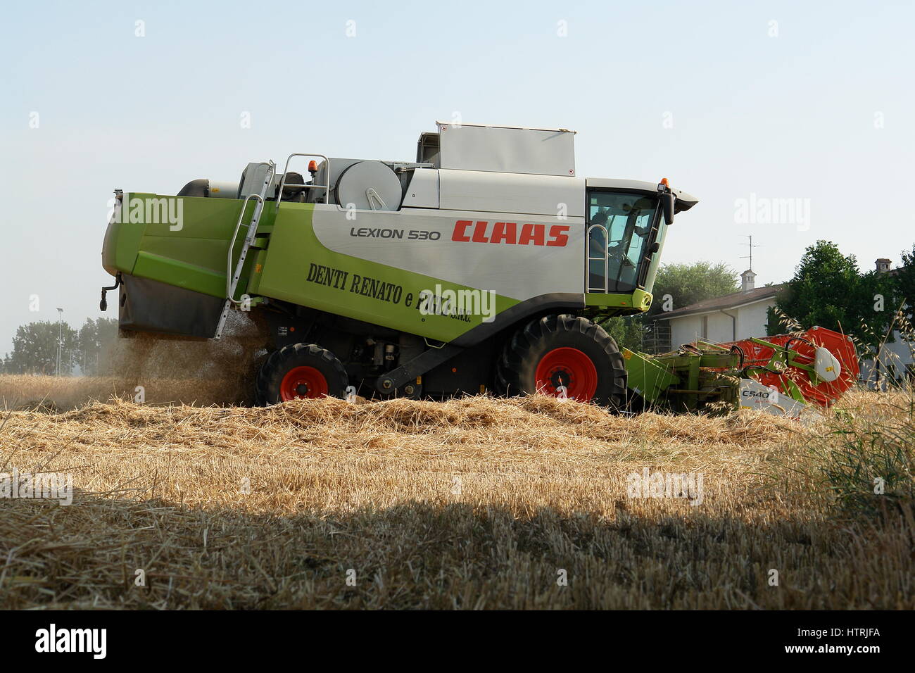 Combine harvester tractor reaper wheat hi-res stock photography and ...