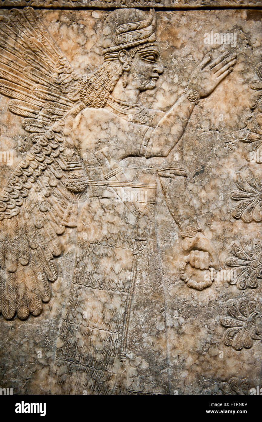 Assyrian relief sculpture panel of a female protective spirit from ...