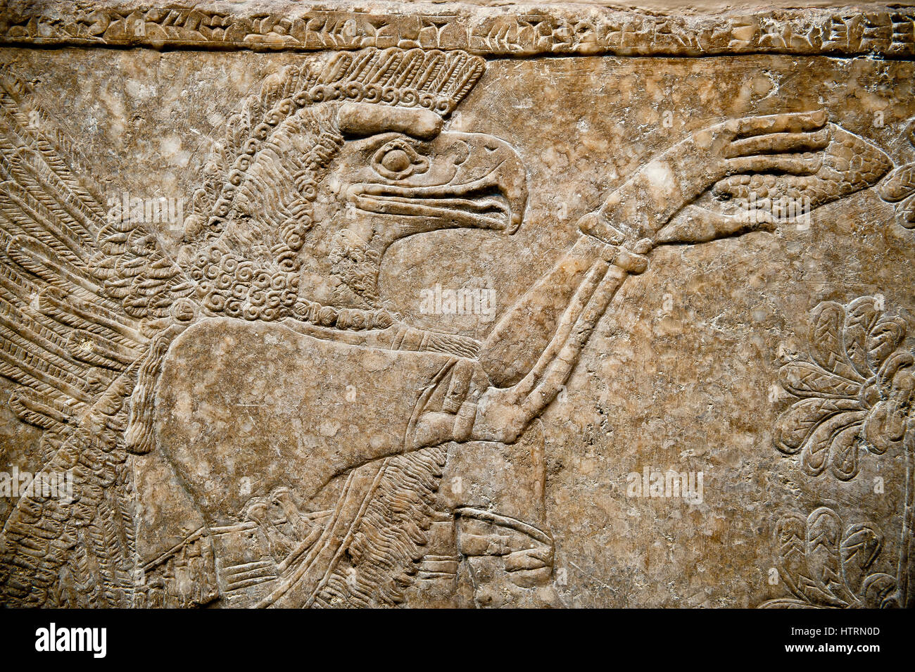 Assyrian relief sculpture panel of an eagle headed protective spirit ...