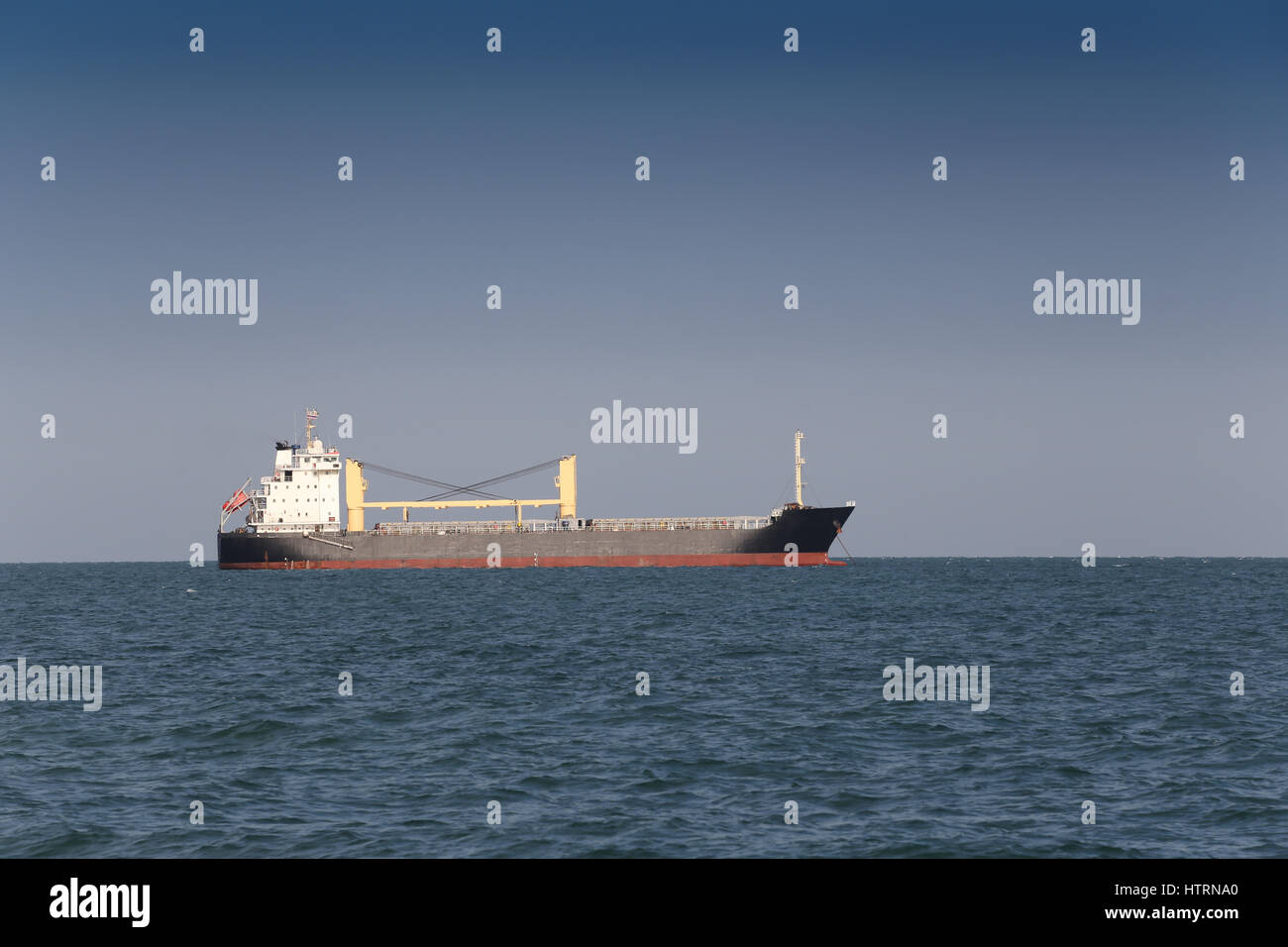 cargo ship in the sea,daytime sky Stock Photo - Alamy