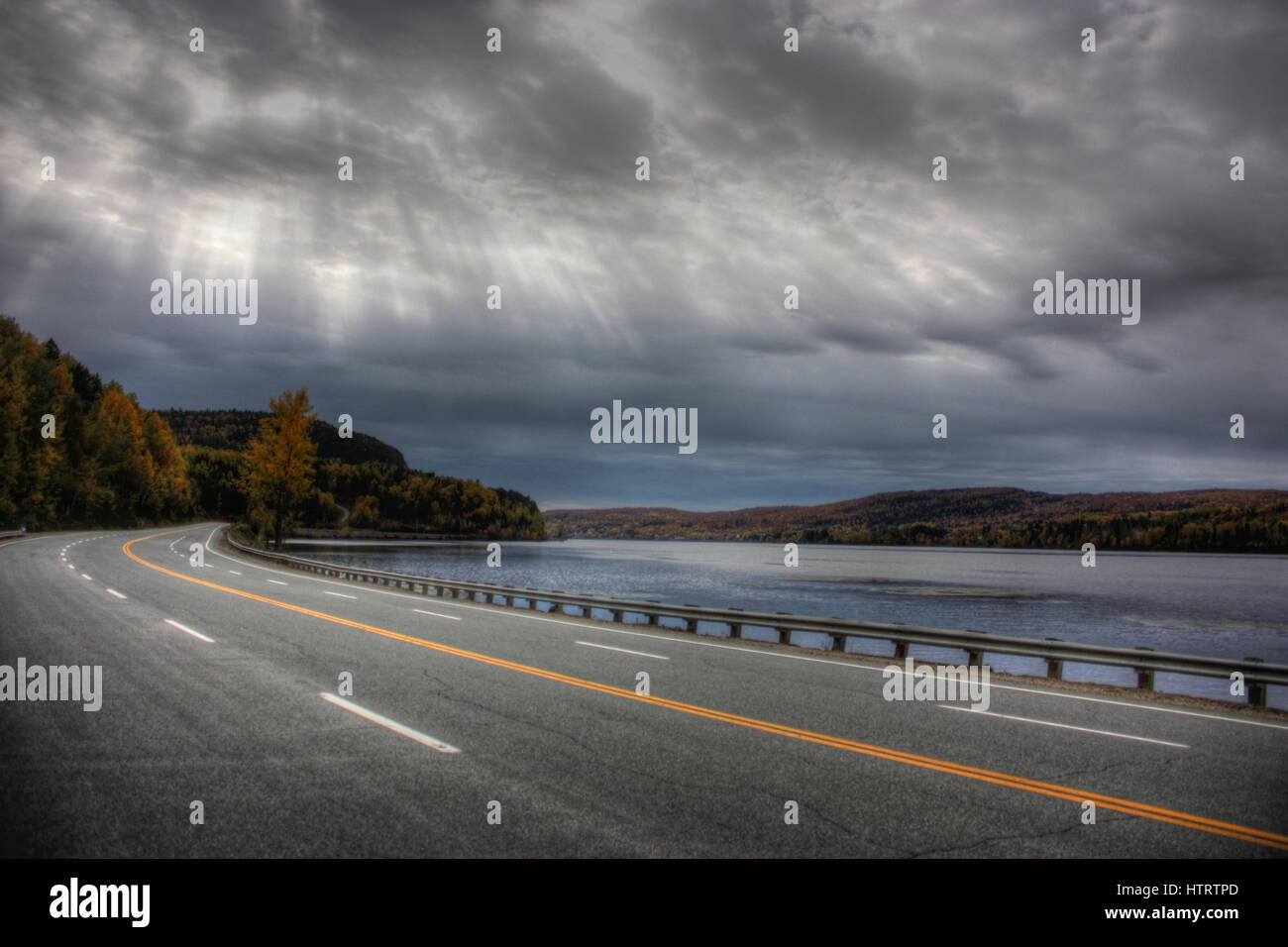 perfect road along a river Stock Photo - Alamy