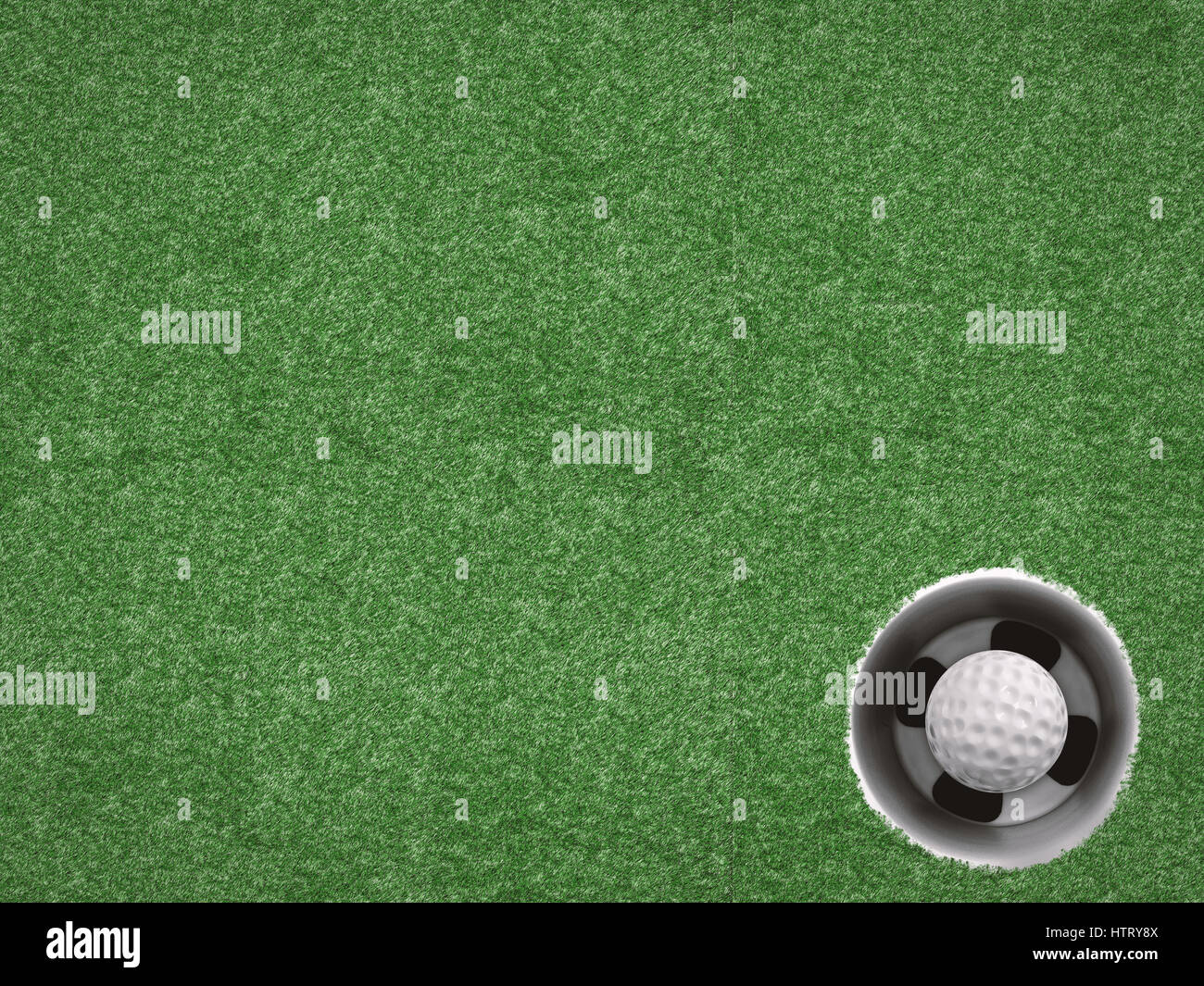 golf ball in golf cup on green top view Stock Photo - Alamy