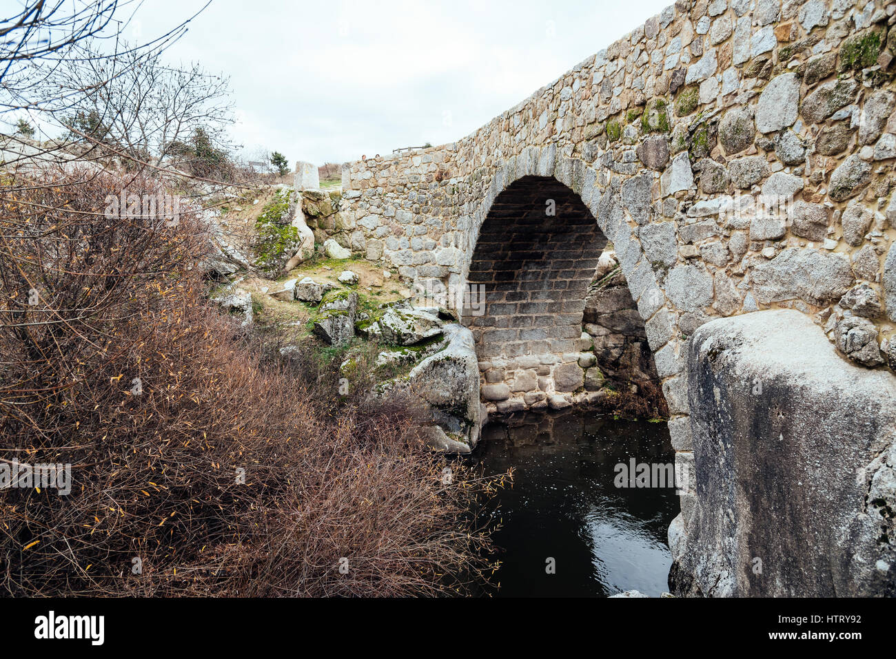 Medieval bridge at Colmenar, Spain. Overcast day Stock Photo - Alamy