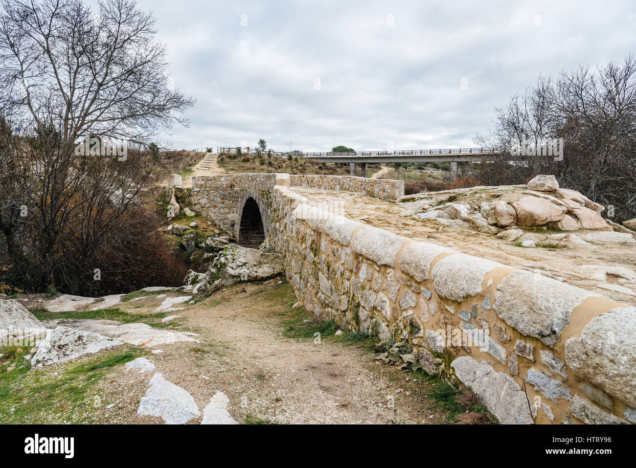 Medieval bridge at Colmenar, Spain. Overcast day Stock Photo - Alamy