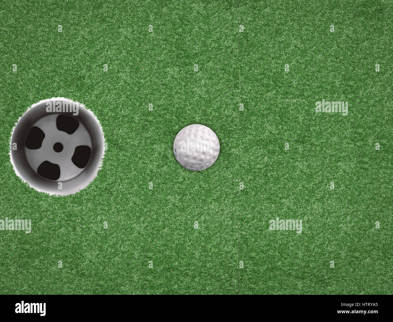 top view golf ball with golf cup on green background Stock Photo - Alamy