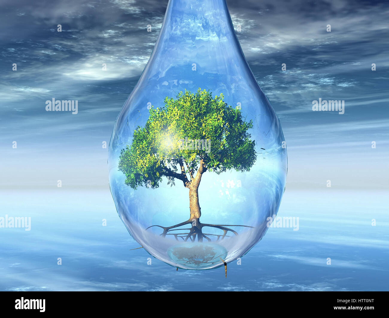green tree in a drop Stock Photo - Alamy