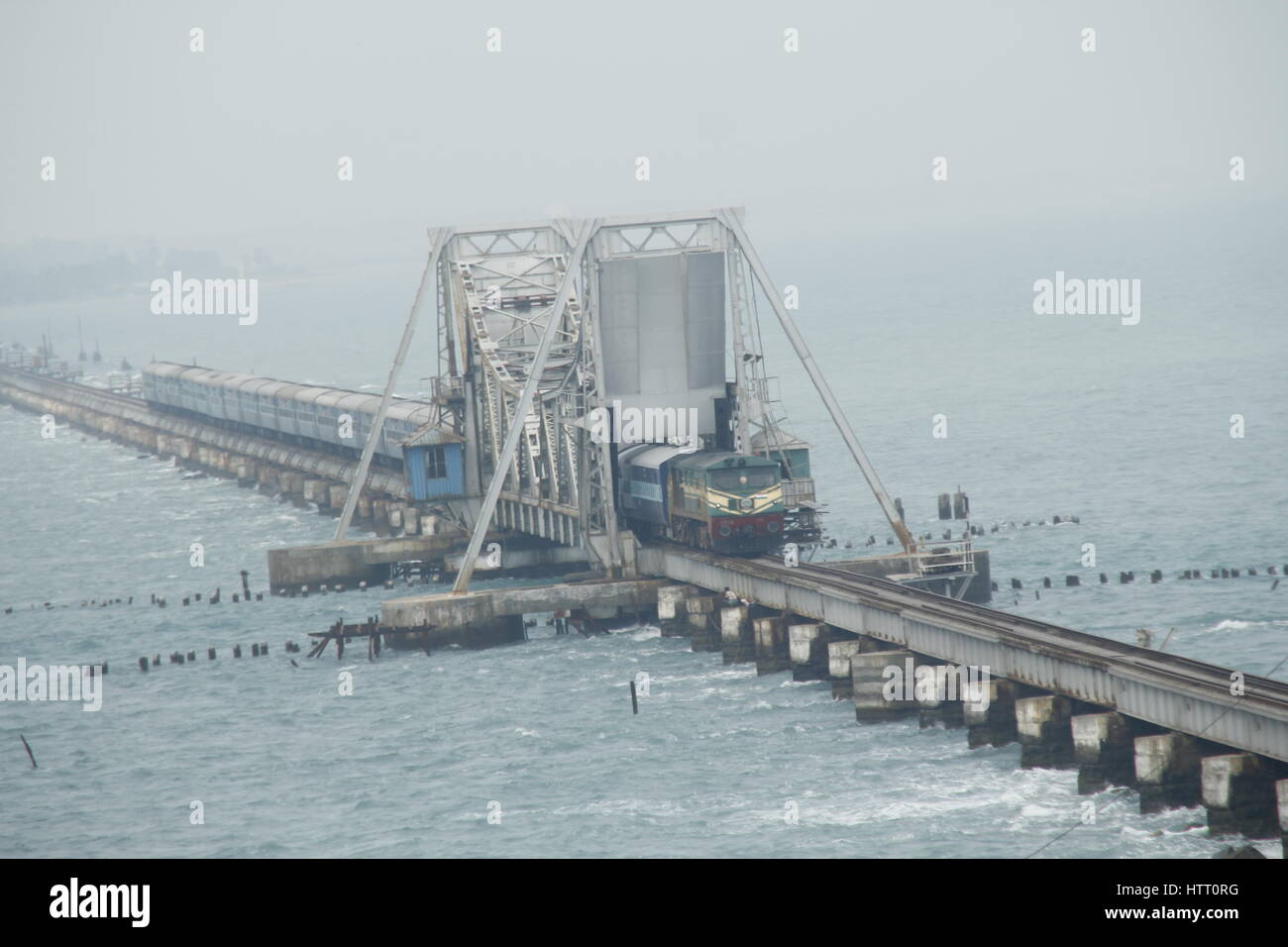 A train on the Pamban Bridge that connects Rameswaram to the Indian ...
