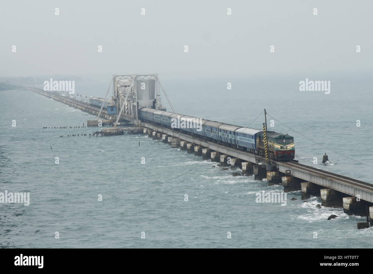A train on the Pamban Bridge that connects Rameswaram to the Indian ...