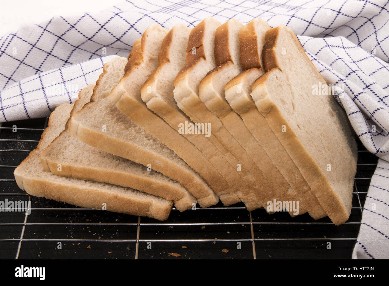 slices of toast bread on a metal cooling rack Stock Photo - Alamy