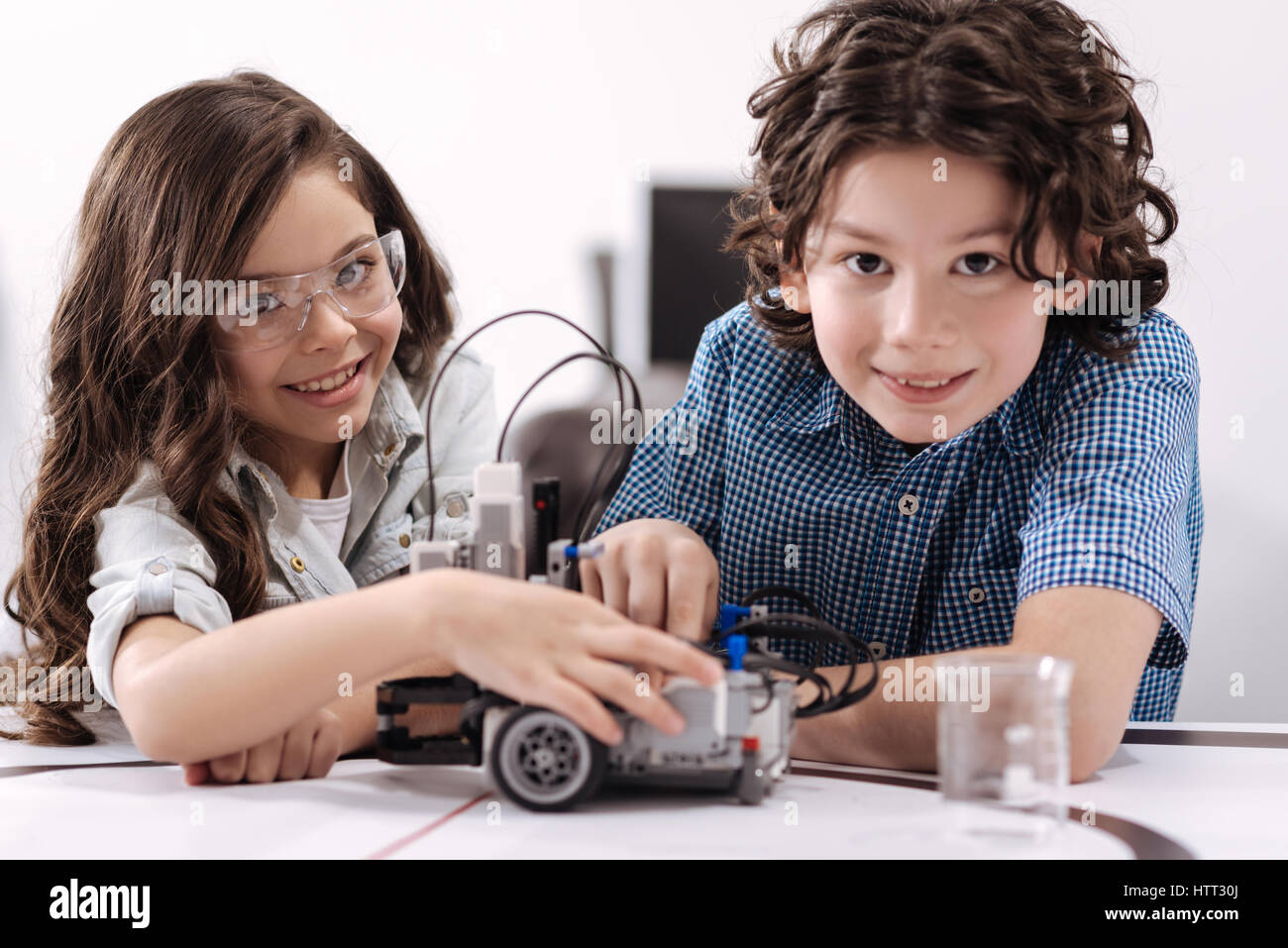 Cheerful children having science lesson at school Stock Photo - Alamy