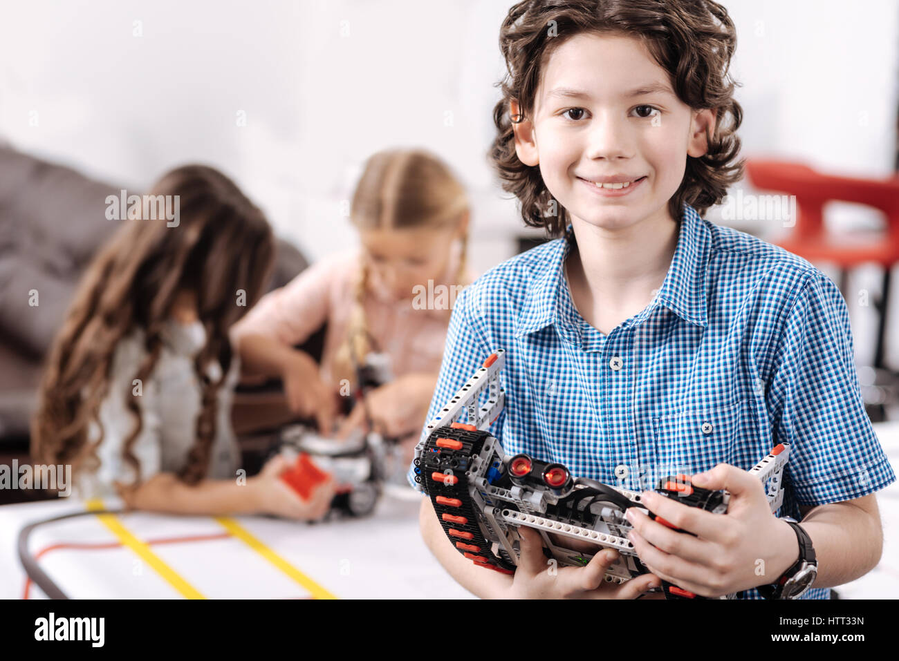 Proud boy representing science project at school Stock Photo - Alamy