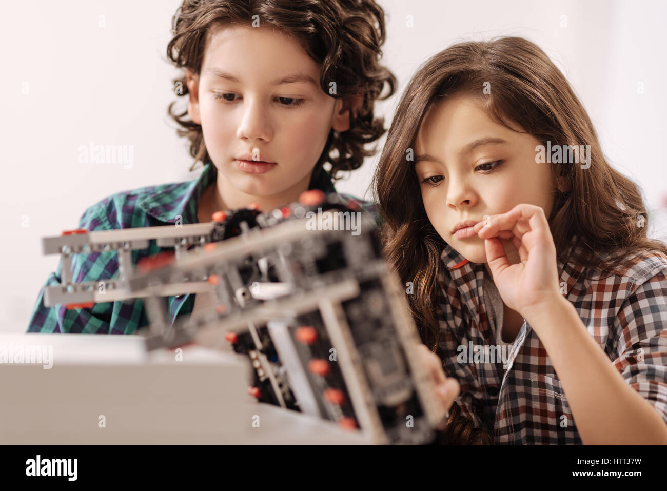 Optimistic children programming robot in the science studio Stock Photo ...