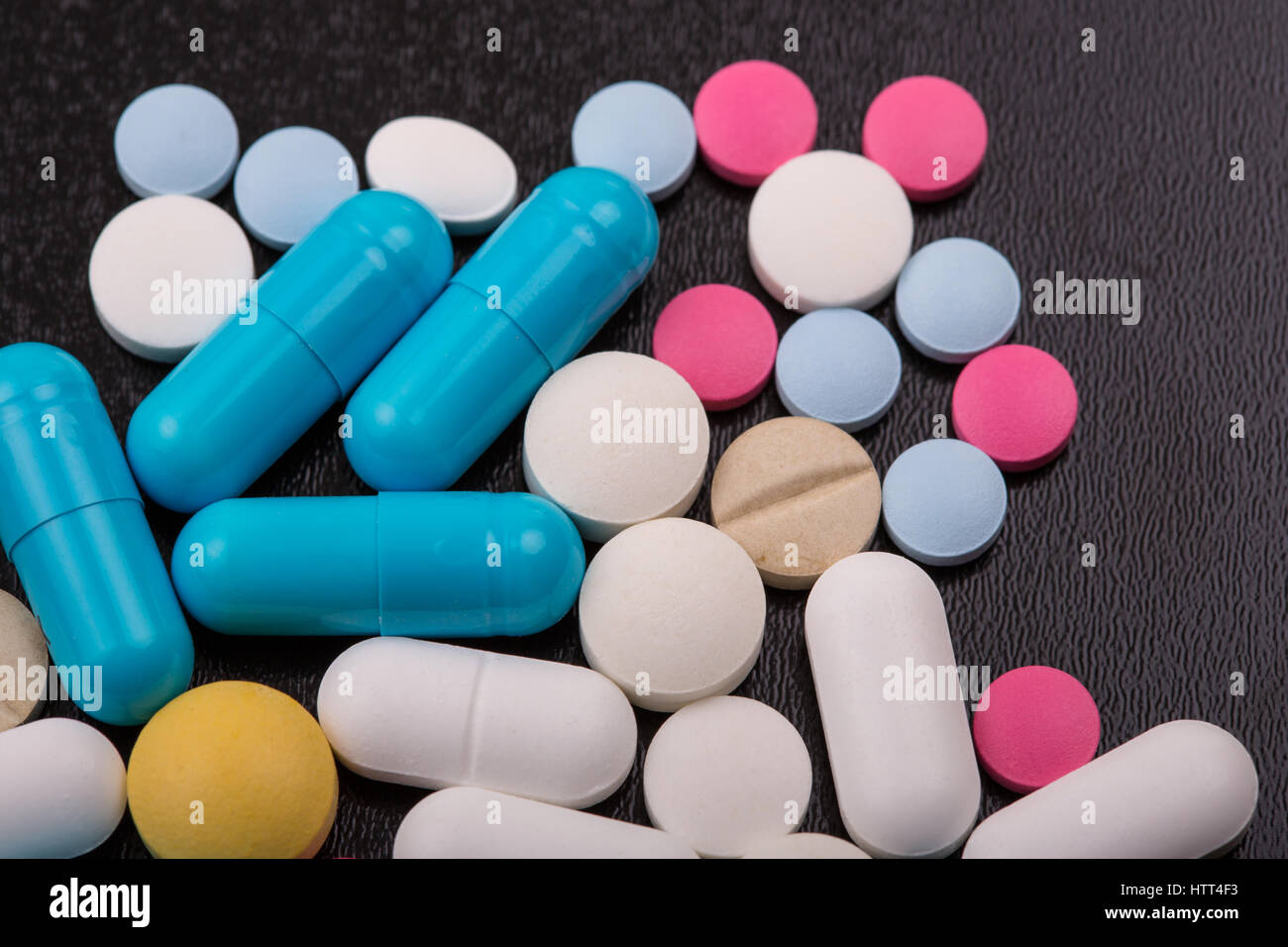different tablets pills capsule heap mix therapy drugs Stock Photo - Alamy