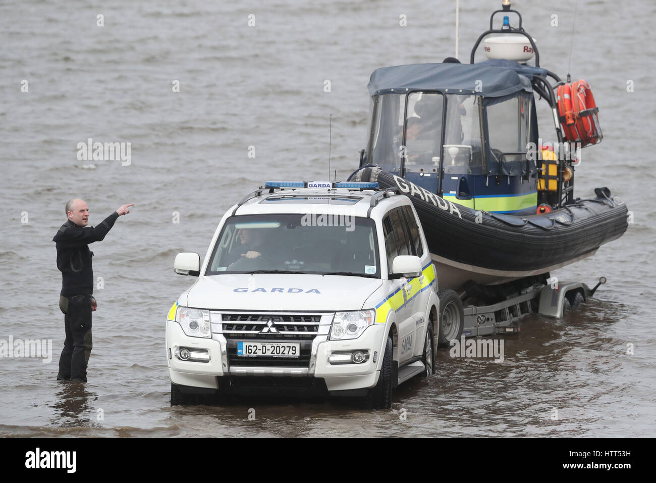 Members of the Garda Water unit prepare to join the search for an Irish ...