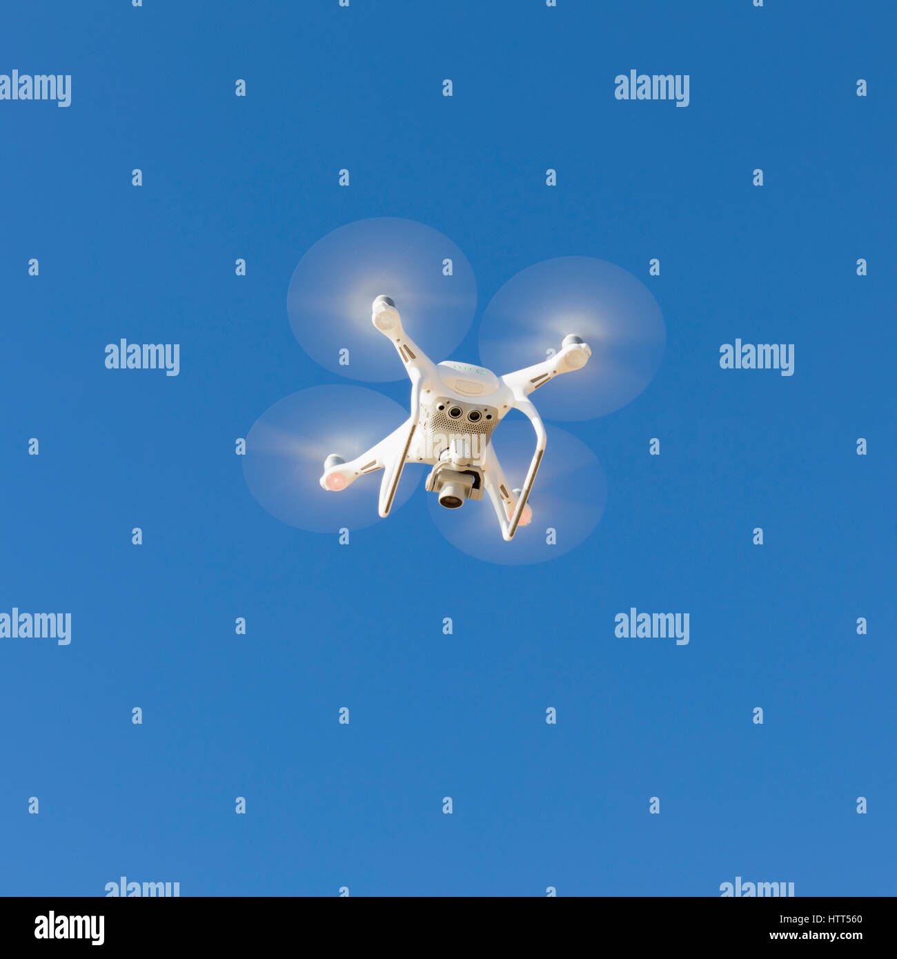DJI Phantom 4 drone with camera in flight Stock Photo - Alamy