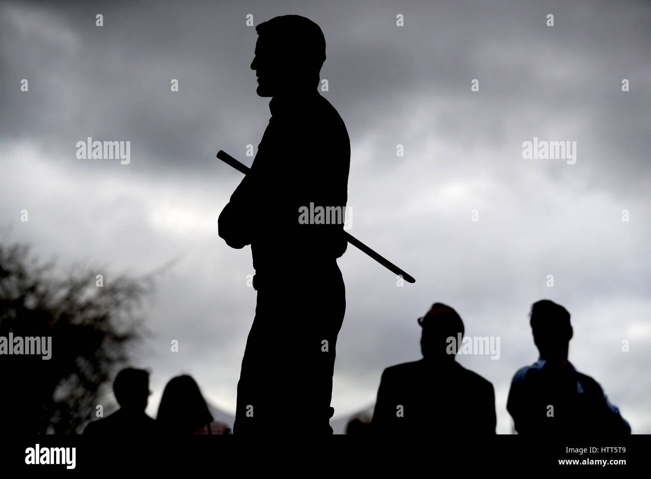The newly unveiled AP McCoy statue in silhouette during Champion Day of ...