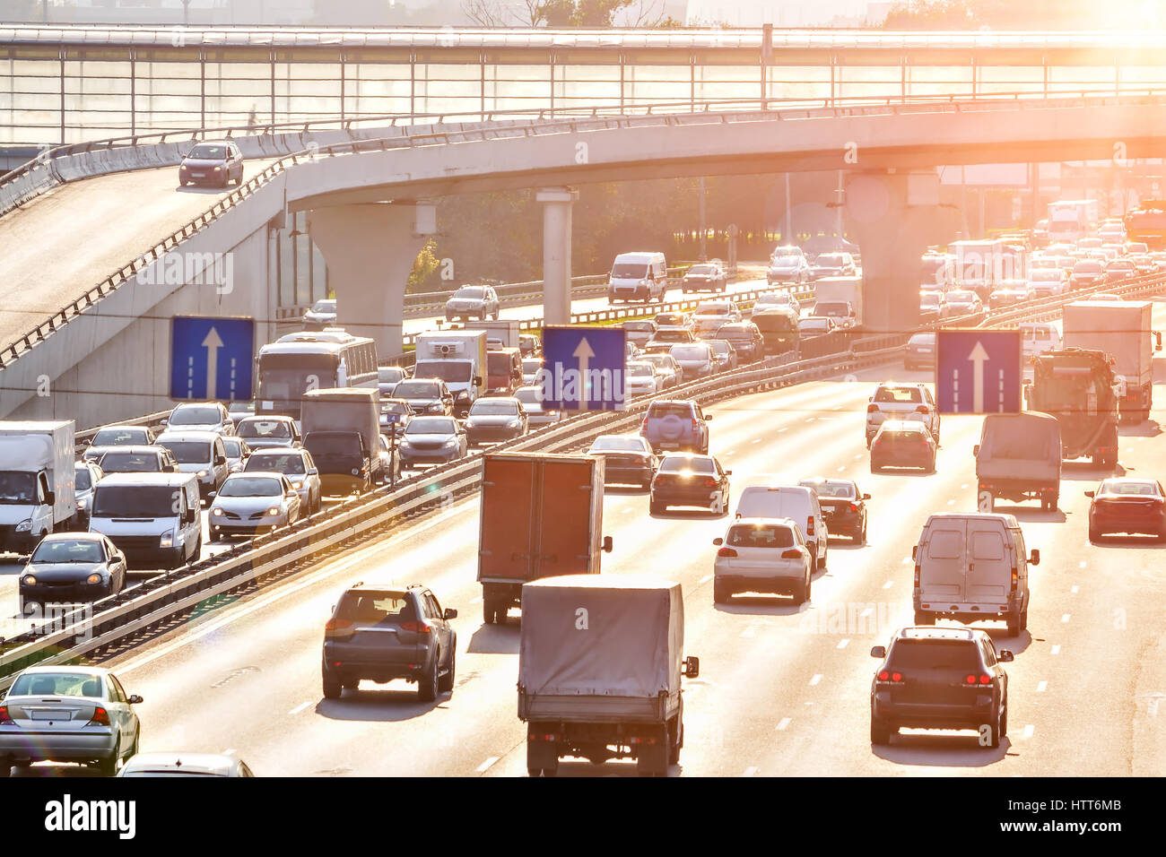 Heavy traffic on the highway with sunlight Stock Photo - Alamy
