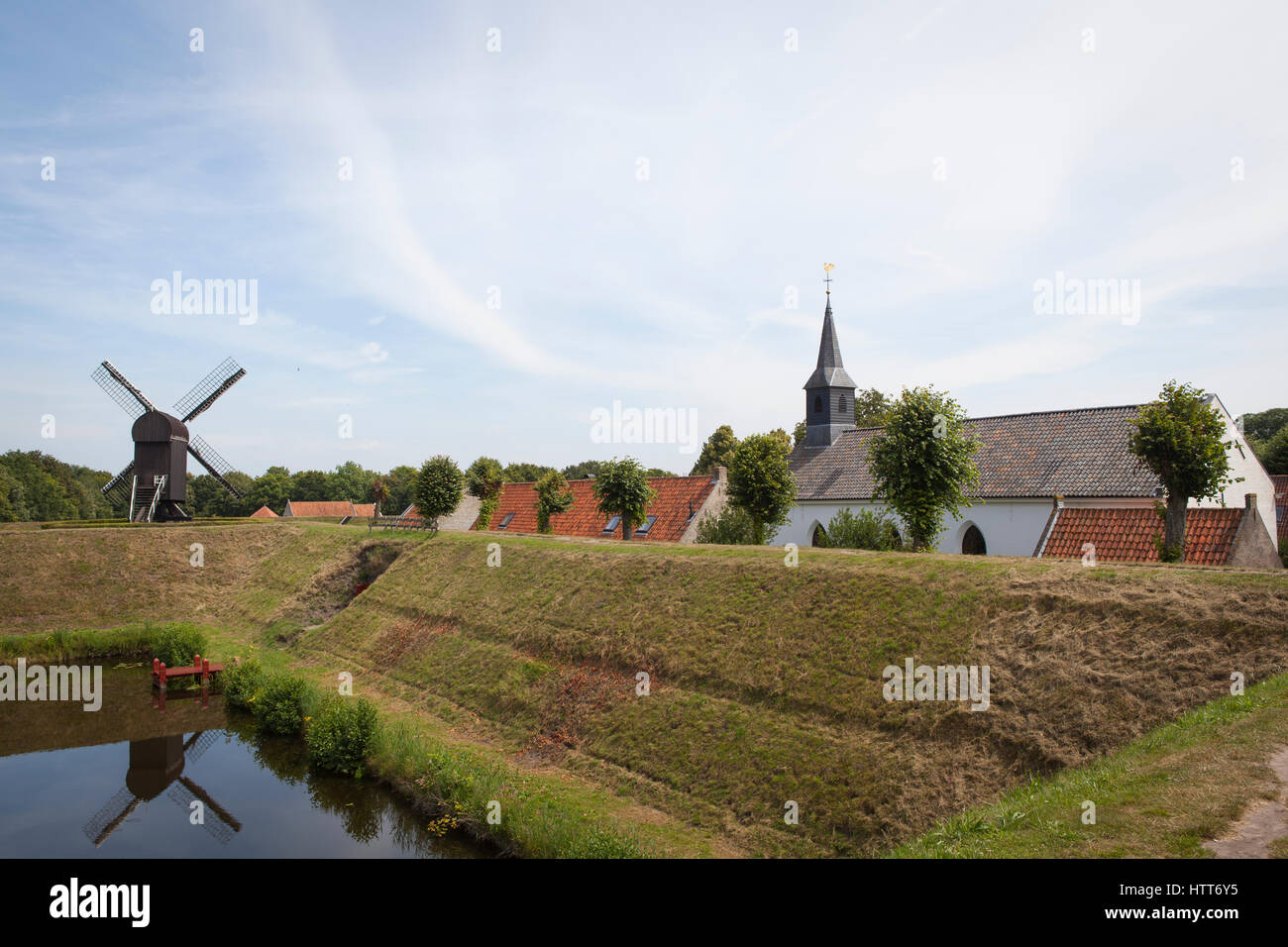 Historical fortress village Bourtange with city walls, a windmill and ...